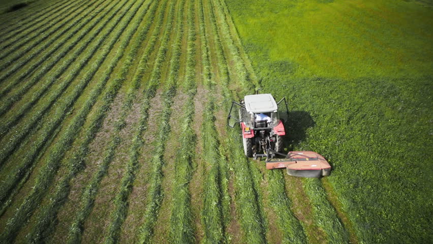 aerial tractor cutting grass hay countryside Stock Footage Video (100% ...