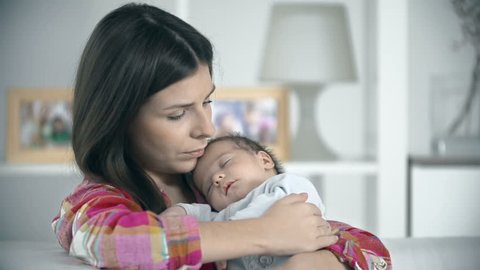 Mother Giving Peck Her Sleeping Newborn Stock Footage Video (100% ...
