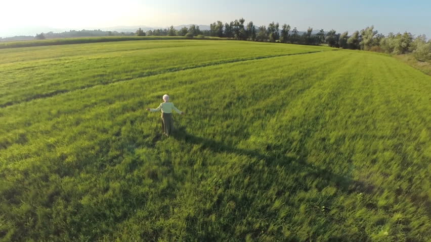 old woman on grass field feeling Stock Footage Video (100% Royalty-free ...