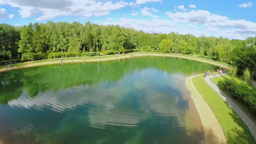 People Walk Near Pond in Stock Footage Video (100% Royalty-free ...