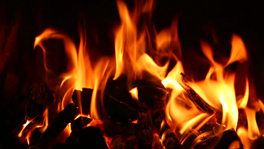 Stoking a Fire in a Stock Footage Video (100% Royalty-free) 8230810 ...