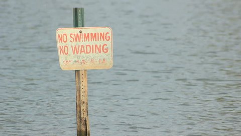 Warning Sign Reads No Swimming Wading Stock Footage Video (100% Royalty ...