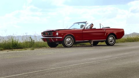 Couple Driving Classic Cherry Red Convertible Stock Footage Video (100% ...