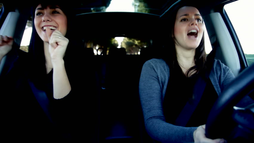 beautiful women driving singing dancing car Stock Footage Video (100% ...