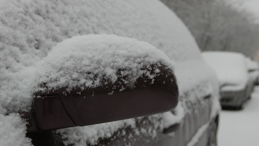 snow falling on car's side mirror Stock Footage Video (100% Royalty ...