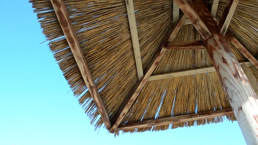 straw canopies on beach shooting winter Stock Footage Video (100% ...