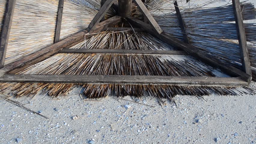 straw canopies on beach shooting winter Stock Footage Video (100% ...
