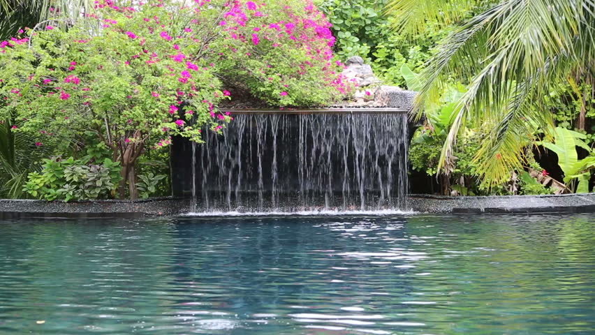 peaceful garden scene waterfall running by Stock Footage Video (100% ...