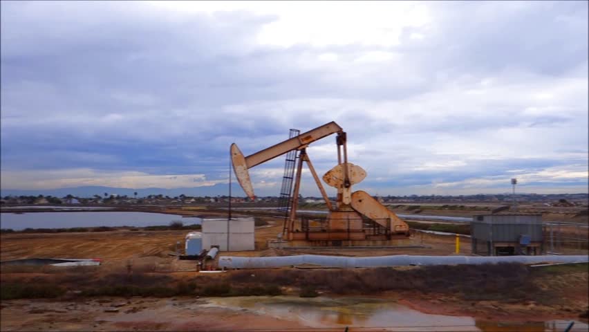 oil derrick field cloudy sky Stock Footage Video (100% Royalty-free ...
