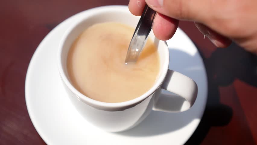 male hand stir milk cup tea Stock Footage Video (100% Royalty-free ...