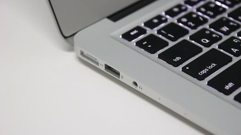 plugging port into laptop connect internet Stock Footage Video (100% ...