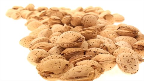 Zoom Multiple Inshell Almonds On White Stock Footage Video (100% ...