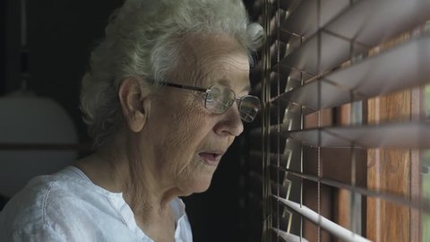 Elderly Woman Granny Look Blinds Window Stock Footage Video (100% ...