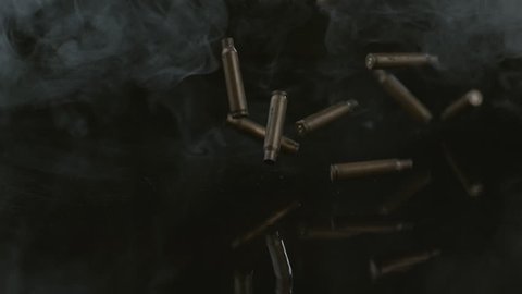 Bullet Shells Smoke Falling Slow Motion Stock Footage Video (100% ...