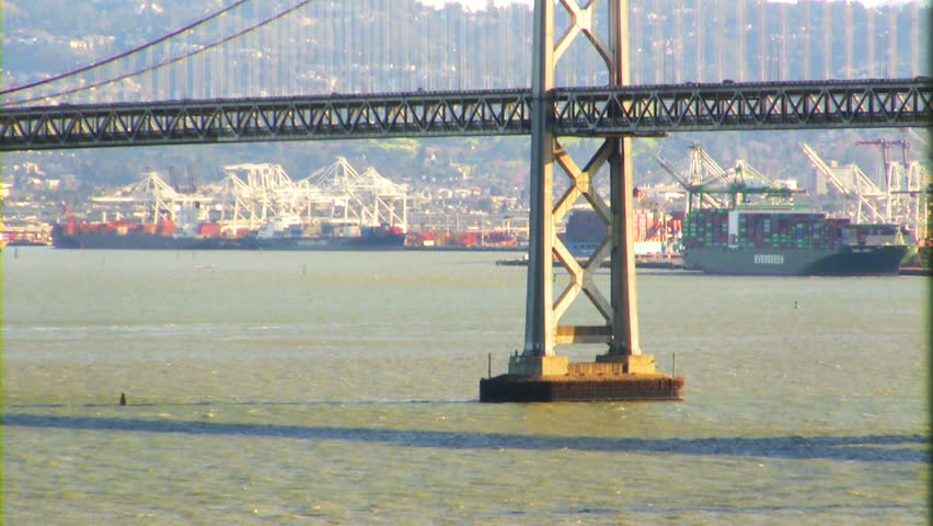 footage cargo ship crossing bay bridge Stock Footage Video (100% ...