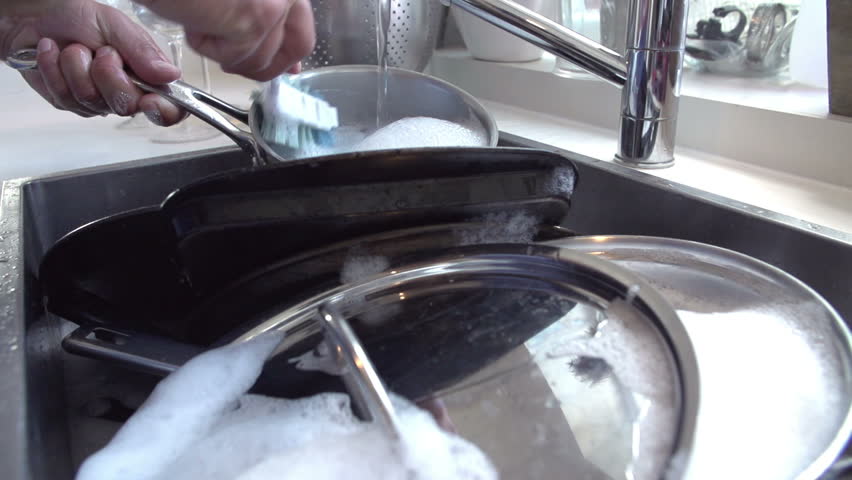 slow motion sequence man washing pots Stock Footage Video (100% Royalty ...