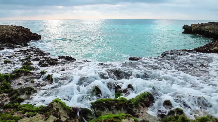 ocean's waves breaking on reef shore Stock Footage Video (100% Royalty ...