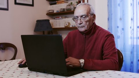 Old Man Using Persona Laptop Computer Stock Footage Video (100% Royalty ...