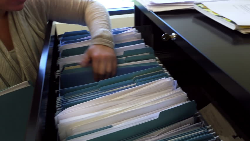 Placing Folder in File Cabinet Stock Footage Video (100% Royalty-free ...