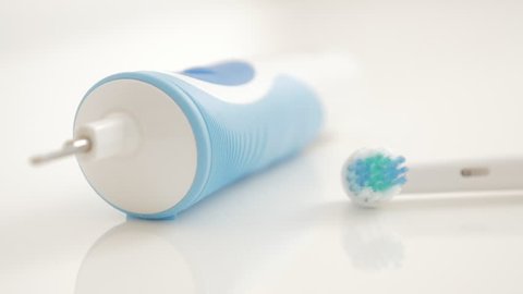 Electric Toothbrush Bristle On White Reflective Stock Footage Video ...