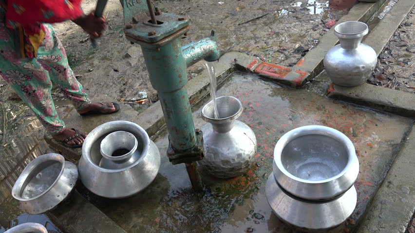 woman uses water pump village bangladesh Stock Footage Video (100% ...