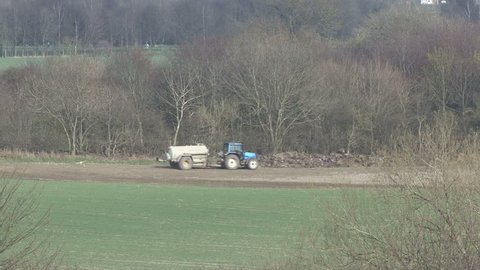 Tractor Tows Slurry Sprayer Field Edge Stock Footage Video (100% ...