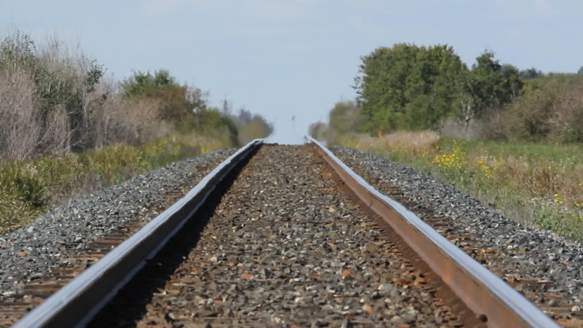 train tracks heat shimmer saskatchewan canada Stock Footage Video (100% ...