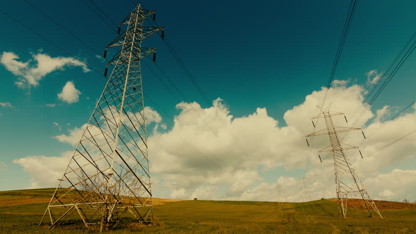 4k electricityhigh voltage pylonpower transmission lines Stock Footage ...