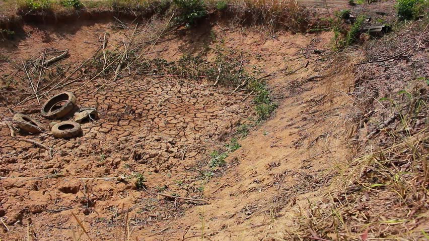 dry cracked earth dried stream bed Stock Footage Video (100% Royalty ...