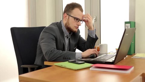 Young Handsome Men Sitting Behind Desk Stock Footage Video (100% ...