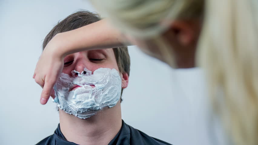barber will start shaving man's face Stock Footage Video (100% Royalty ...