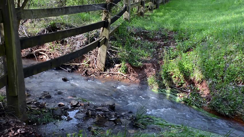 babbling brook spring runs under old Stock Footage Video (100% Royalty ...