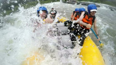 whitewater rafting team descending raging rapids Stock Footage Video ...